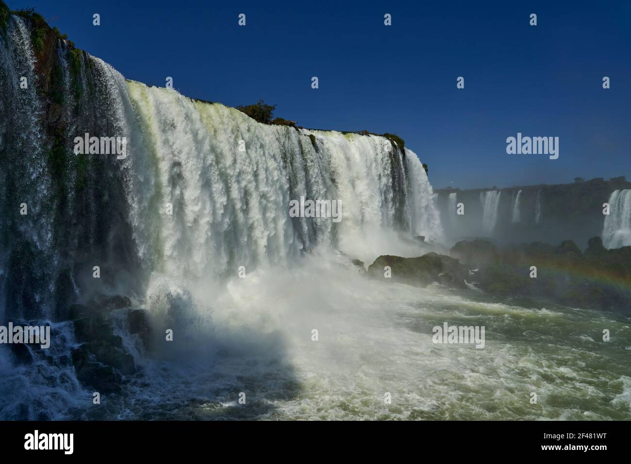 Iguazu Falls or Iguacu Falls, on the border of Argentina and Brazil ...