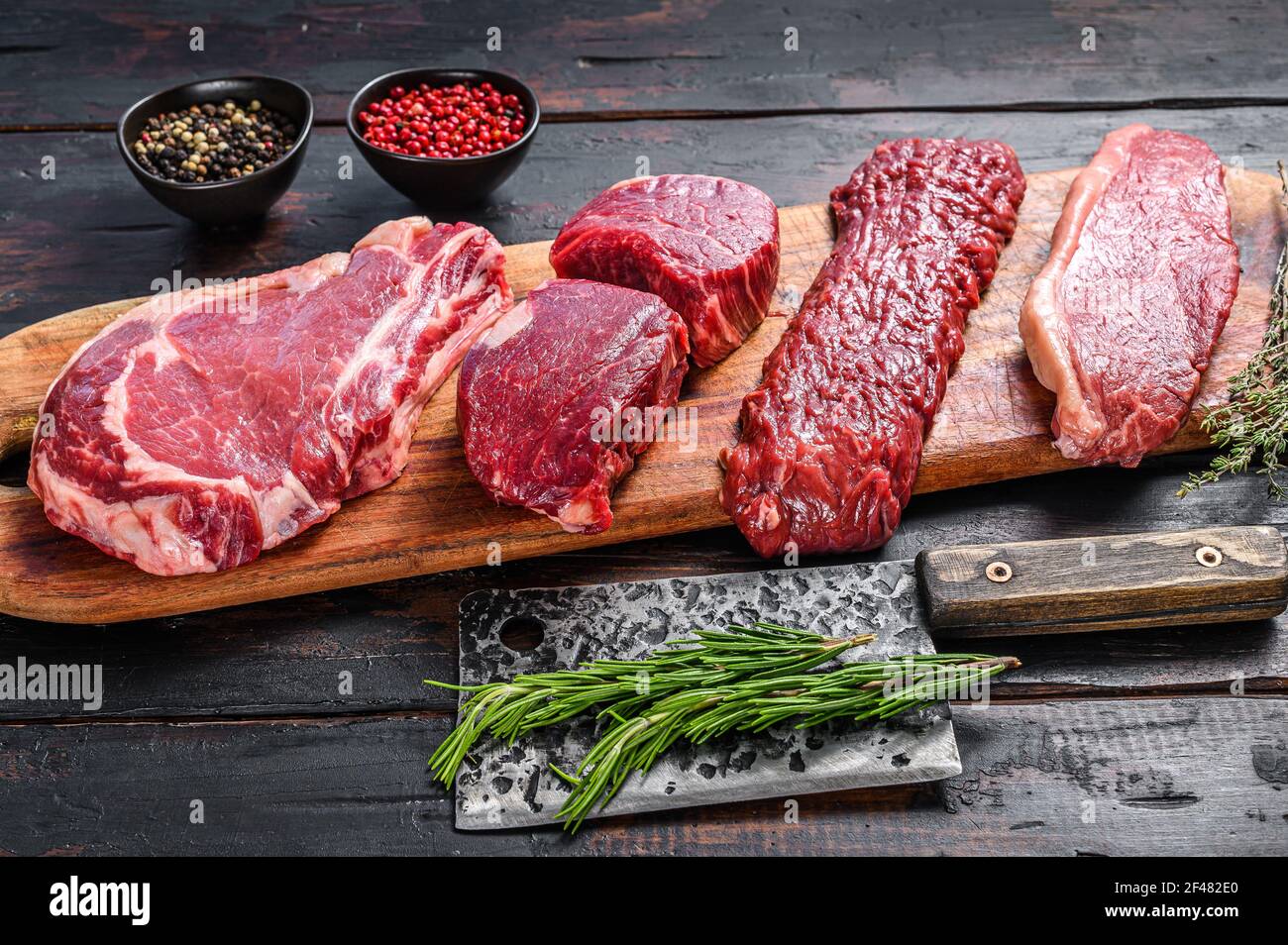 Raw prime black angus beef steaks fillet Mignon, rib eye or cowboy ...