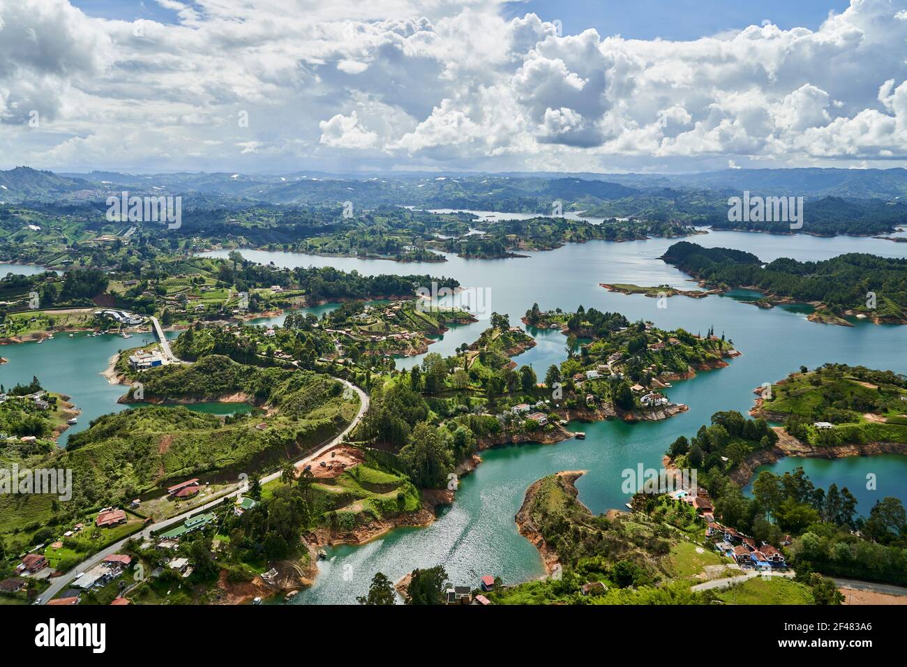 View Of Guatape From The Top Of El Penon Onto The Artificial Lake With