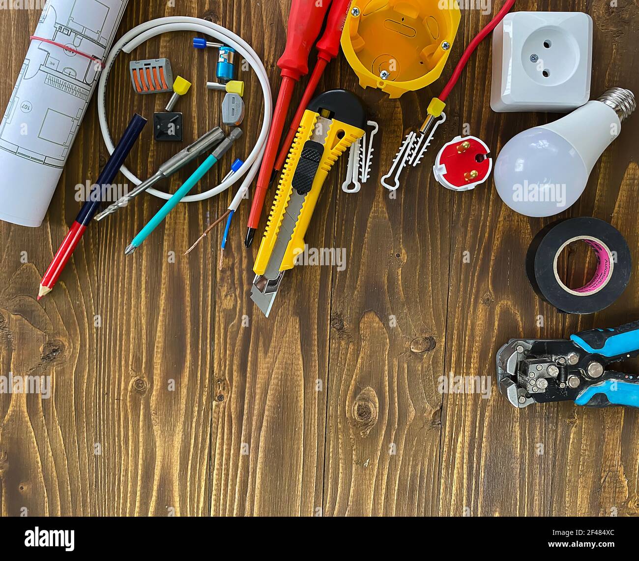 Builder handyman with construction tools Stock Photo - Alamy