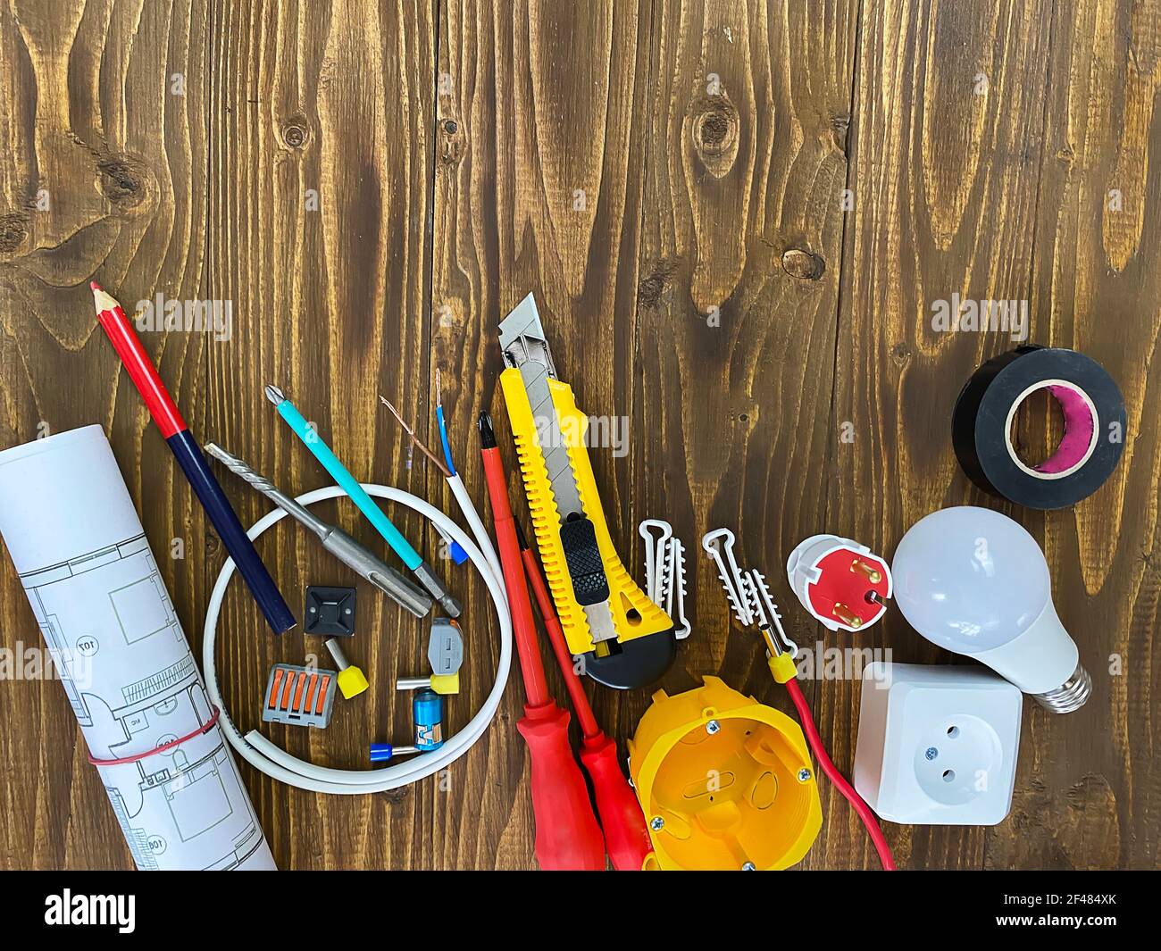 Builder handyman with construction tools Stock Photo - Alamy
