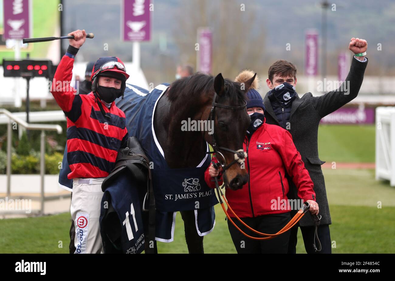 Jockey Lorcan Williams and trainer Will Biddick celebrate winning the ...