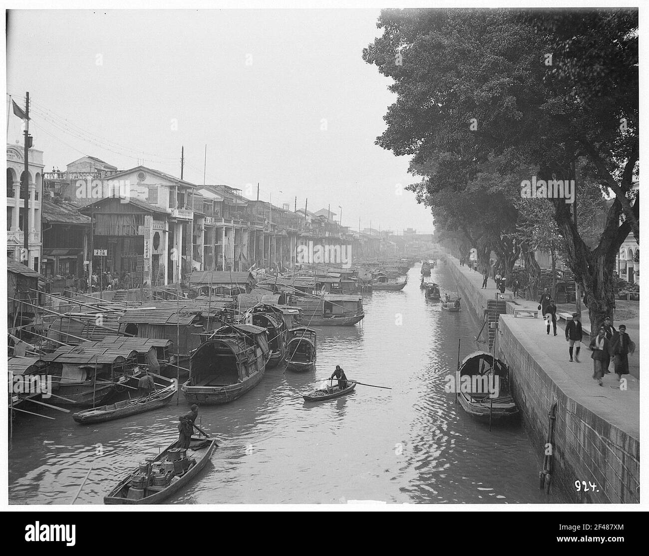 Canton (Guangzhou), China. Urban canal with Junk Stock Photo - Alamy