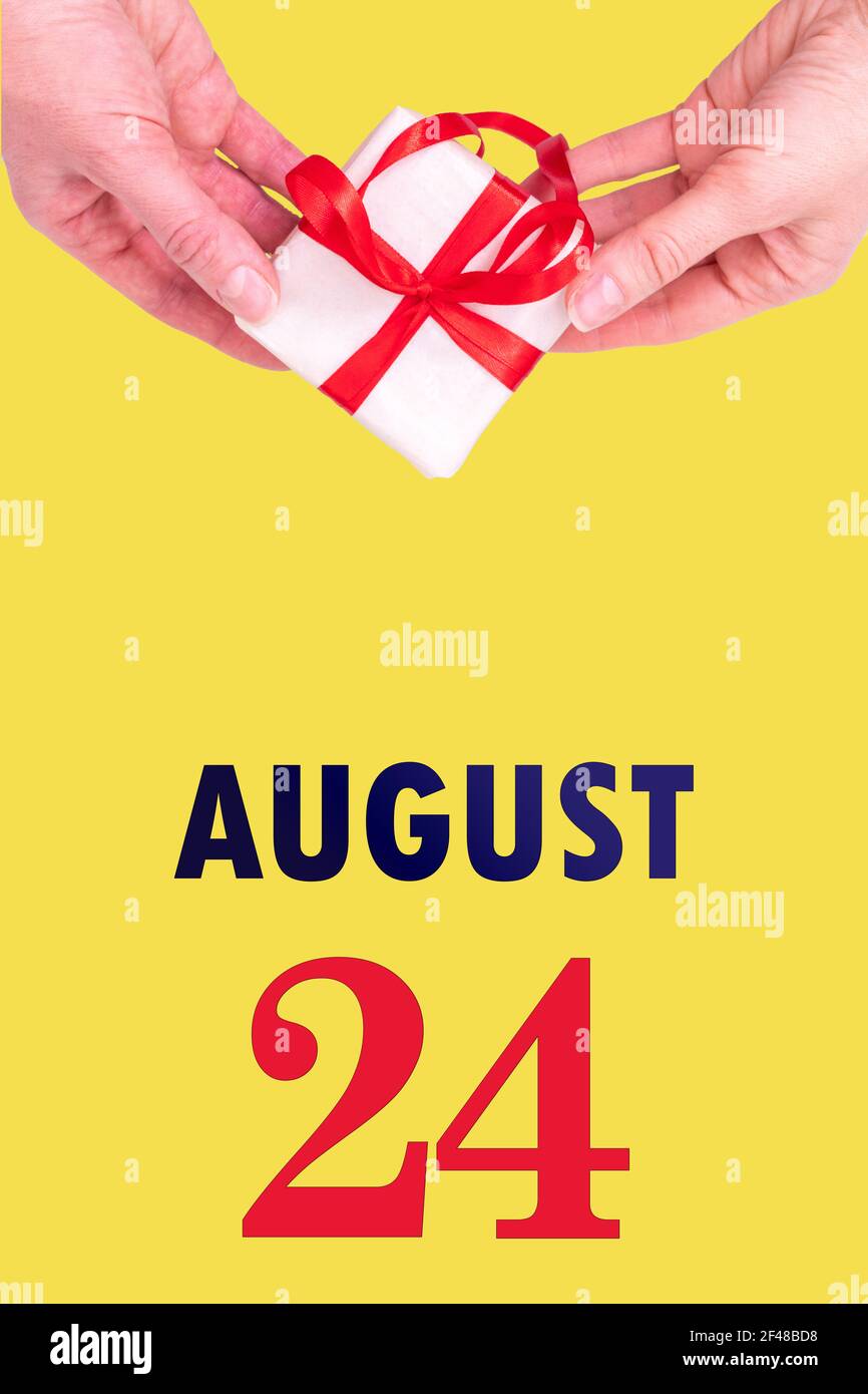 August 24th. Festive Vertical Calendar With Hands Holding White Gift ...
