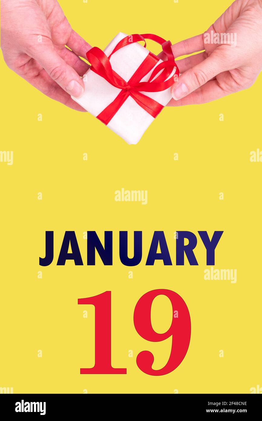 January 19th. Festive Vertical Calendar With Hands Holding White Gift ...