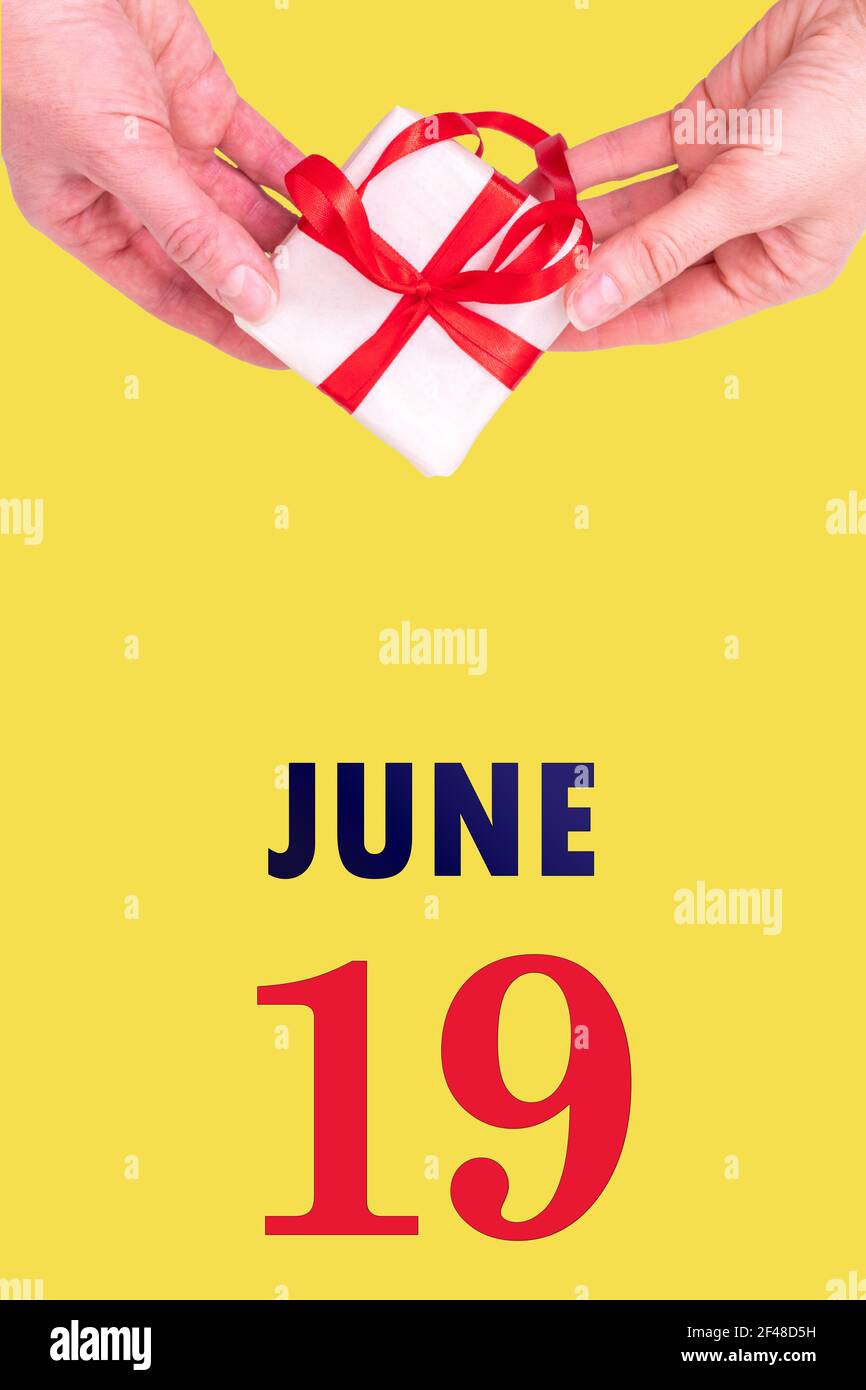 June 19th. Festive Vertical Calendar With Hands Holding White Gift Box ...