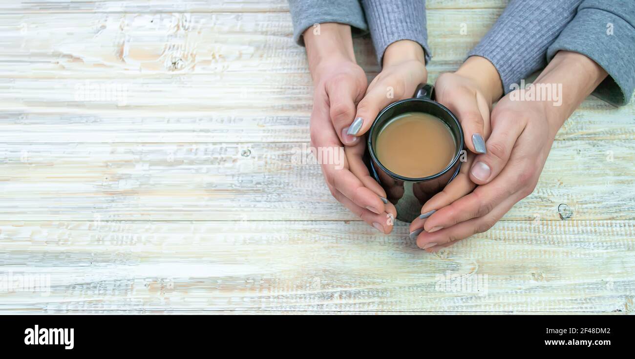 Concept of male and female hands, love and coffee Stock Photo - Alamy