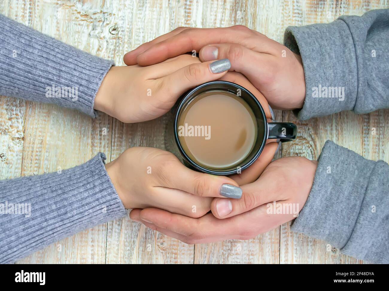 Concept of male and female hands, love and coffee Stock Photo - Alamy