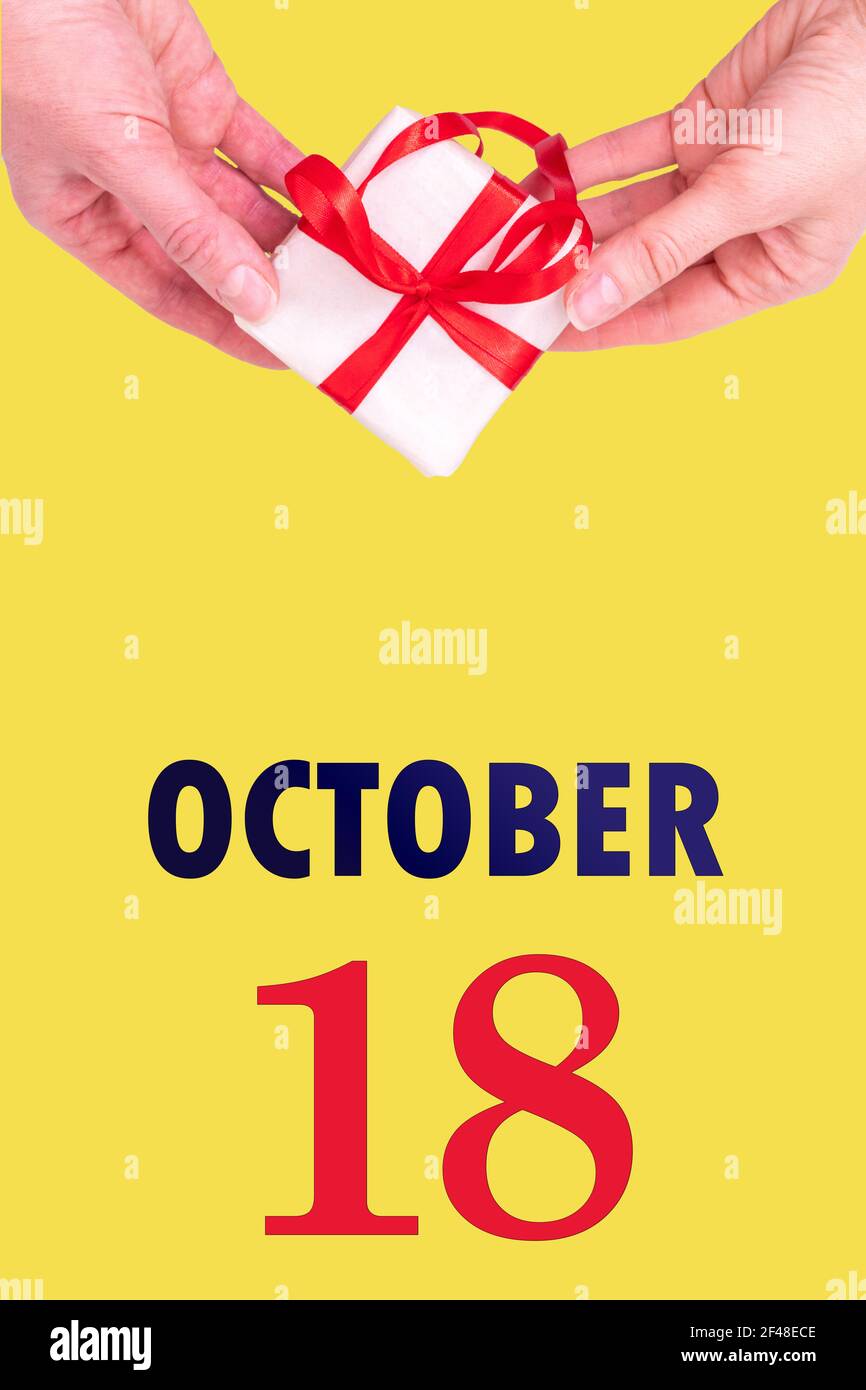 October 18th. Festive Vertical Calendar With Hands Holding White Gift ...
