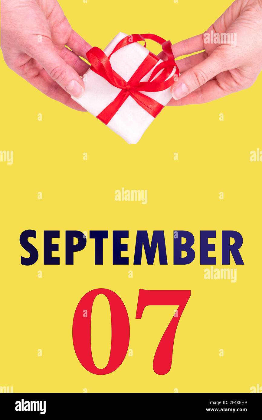 September 7th. Festive Vertical Calendar With Hands Holding White Gift ...