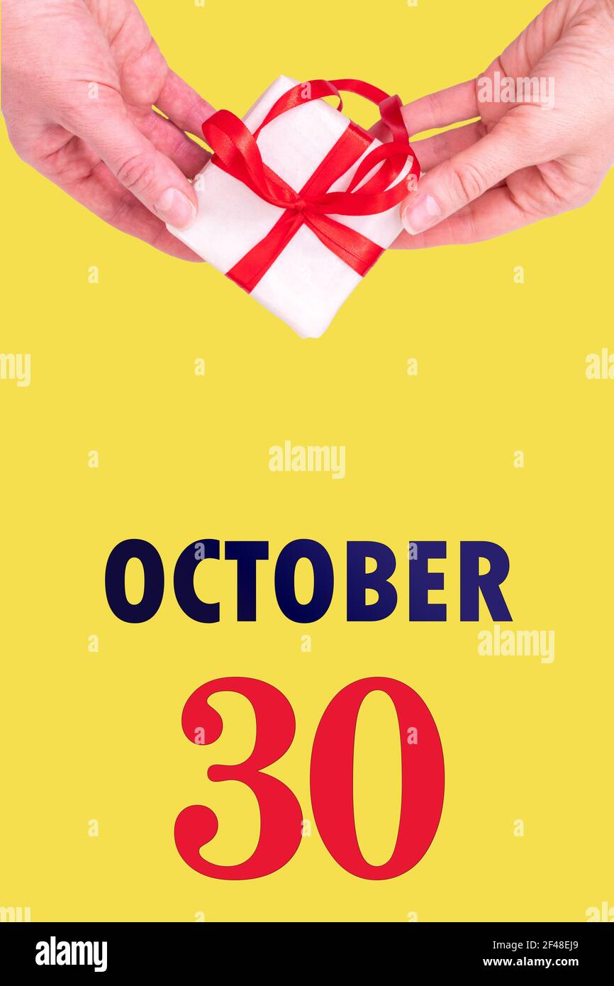 October 30th. Festive Vertical Calendar With Hands Holding White Gift ...