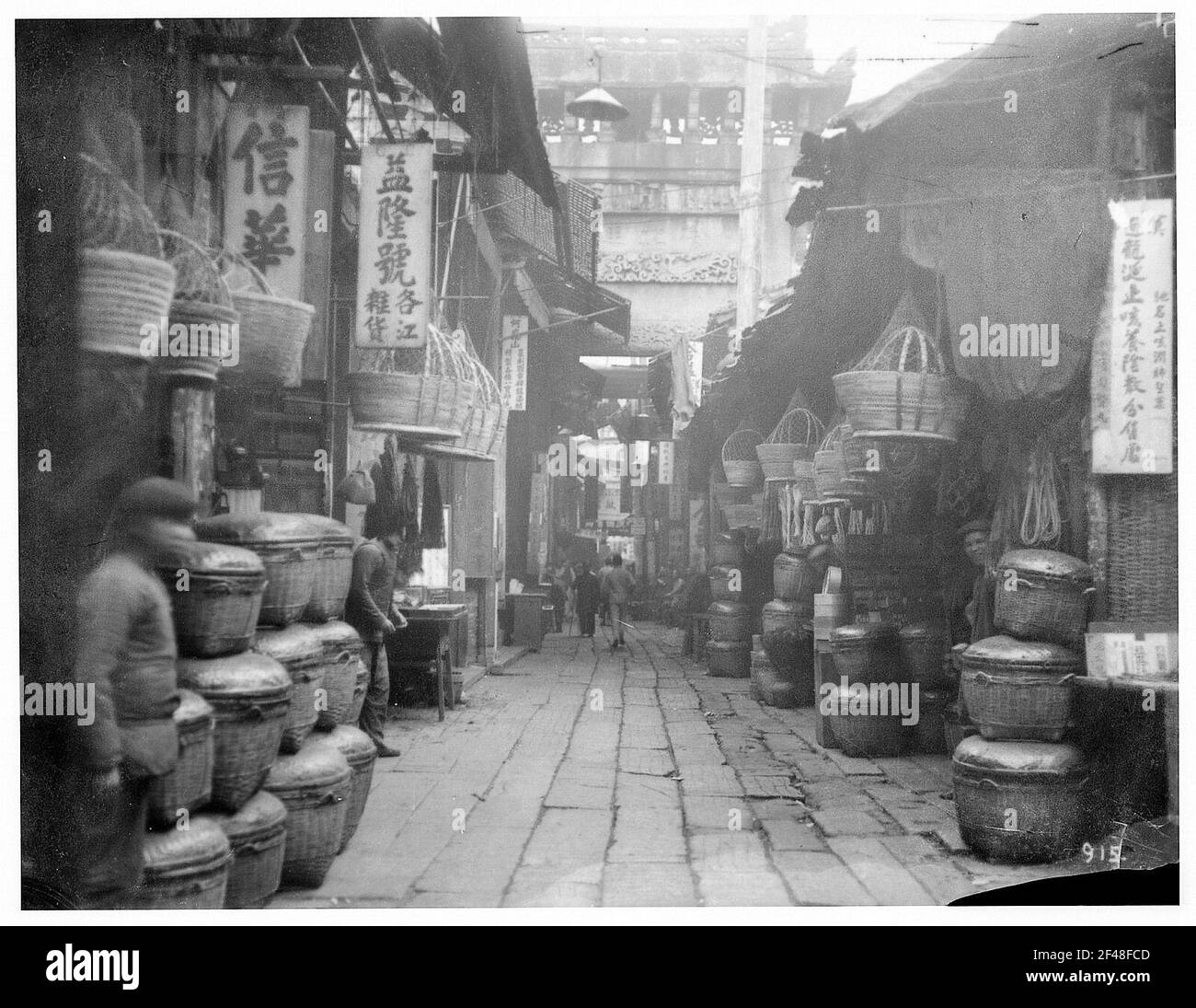 Canton (Guangzhou), China. Alley with shops of baskets Stock Photo - Alamy