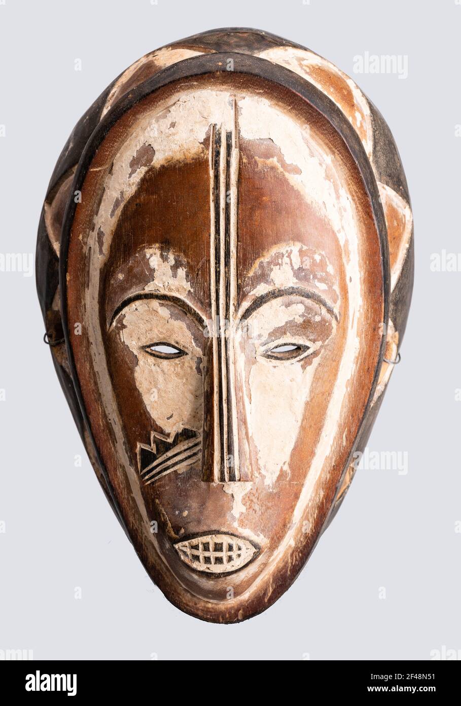 African traditional wood carving - mask, Cameroon Stock Photo - Alamy