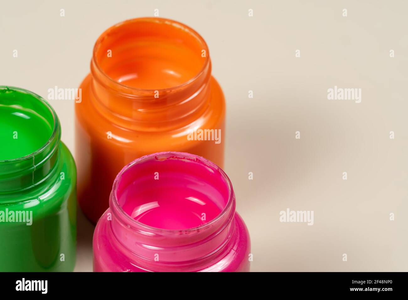 open gouache paint glass opened with copy space Stock Photo - Alamy