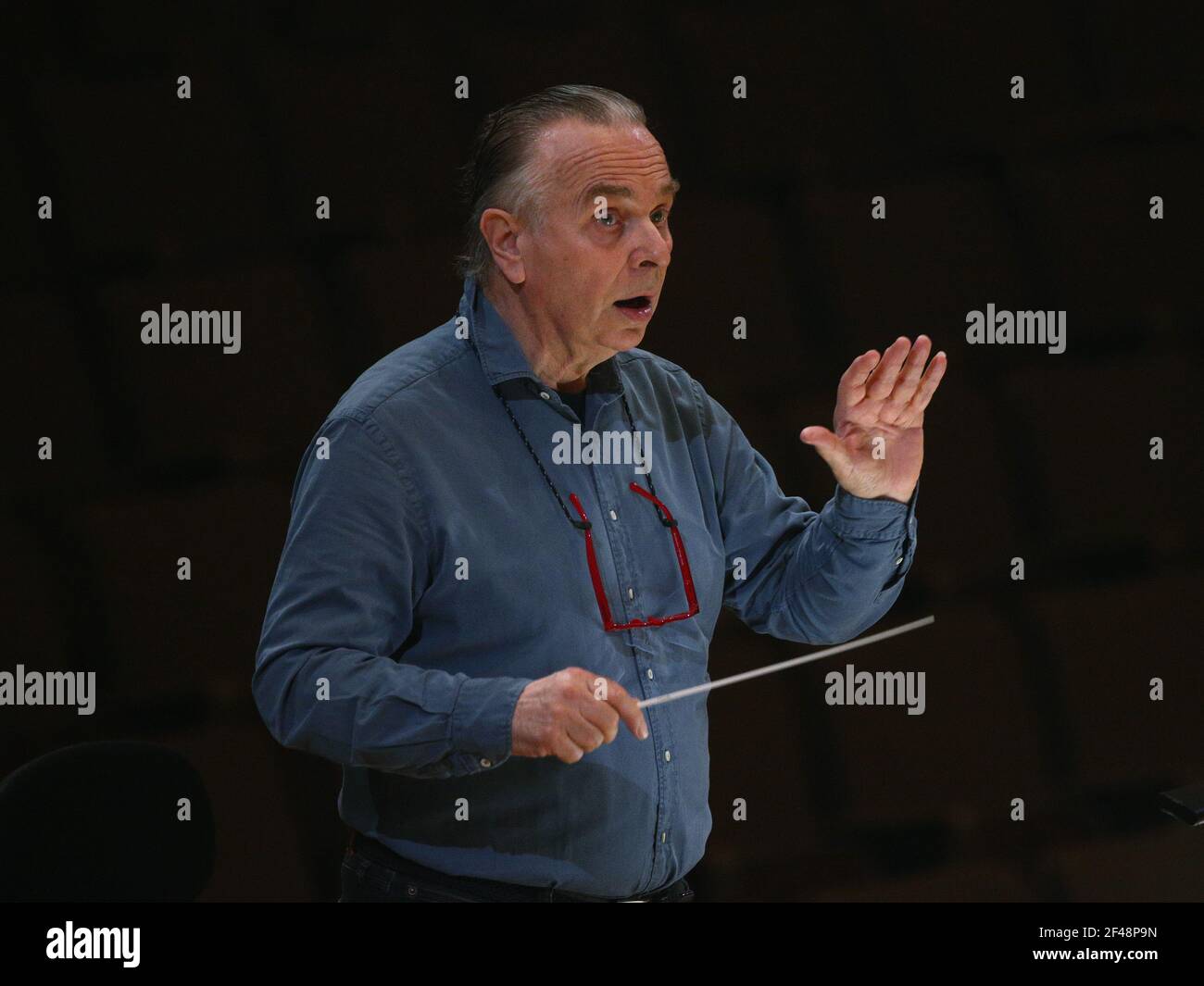 Conductor Sir Mark Elder with the London Philharmonic Orchestra ...