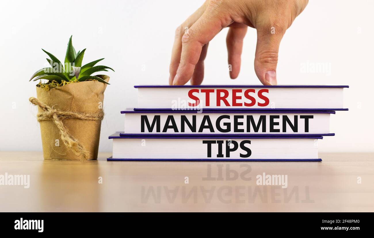 Stress management tips symbol. Books with words 'Stress management tips ...