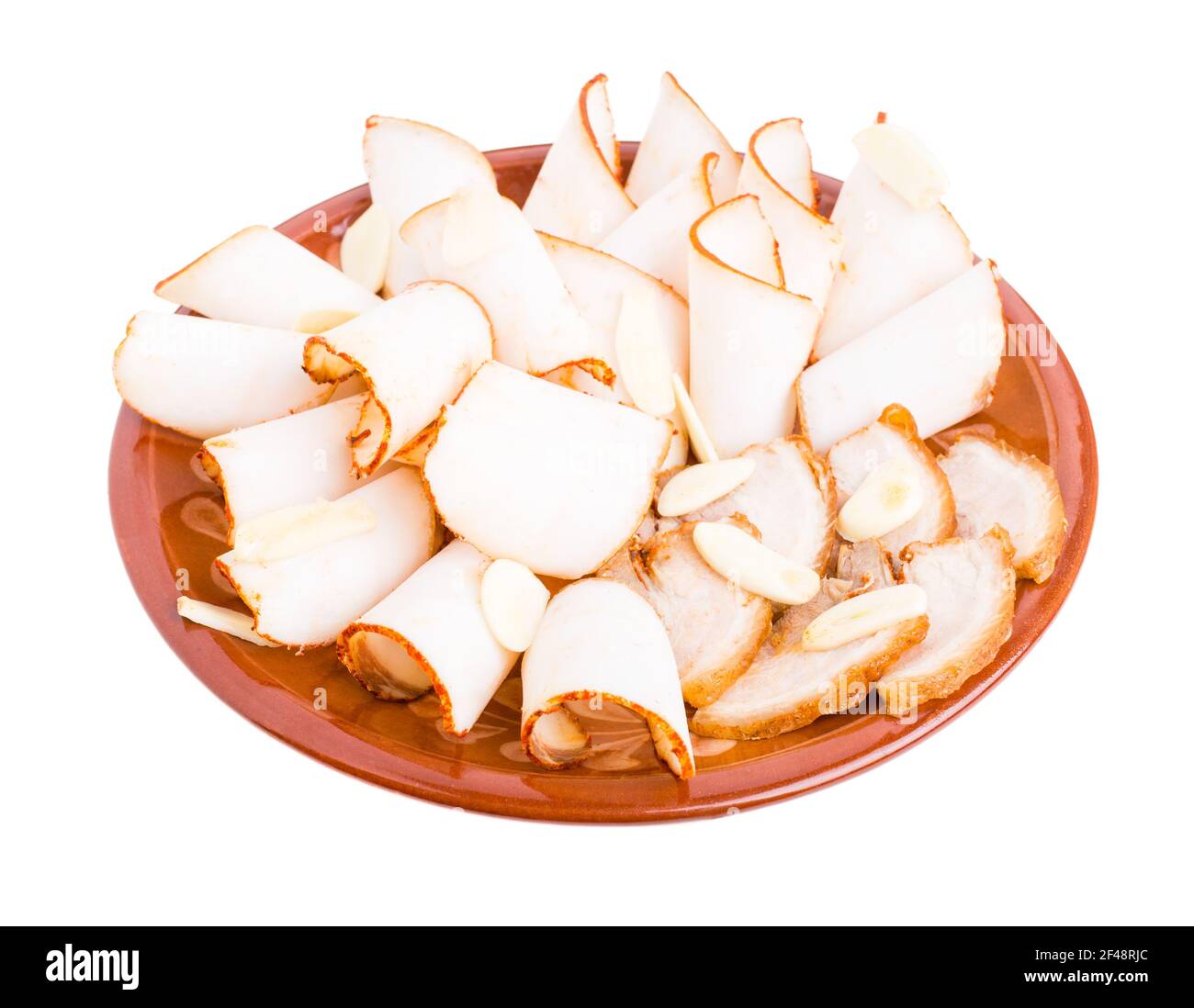 Sliced pork fat lard. Delicious ukrainian starter. Served on brown clay ...