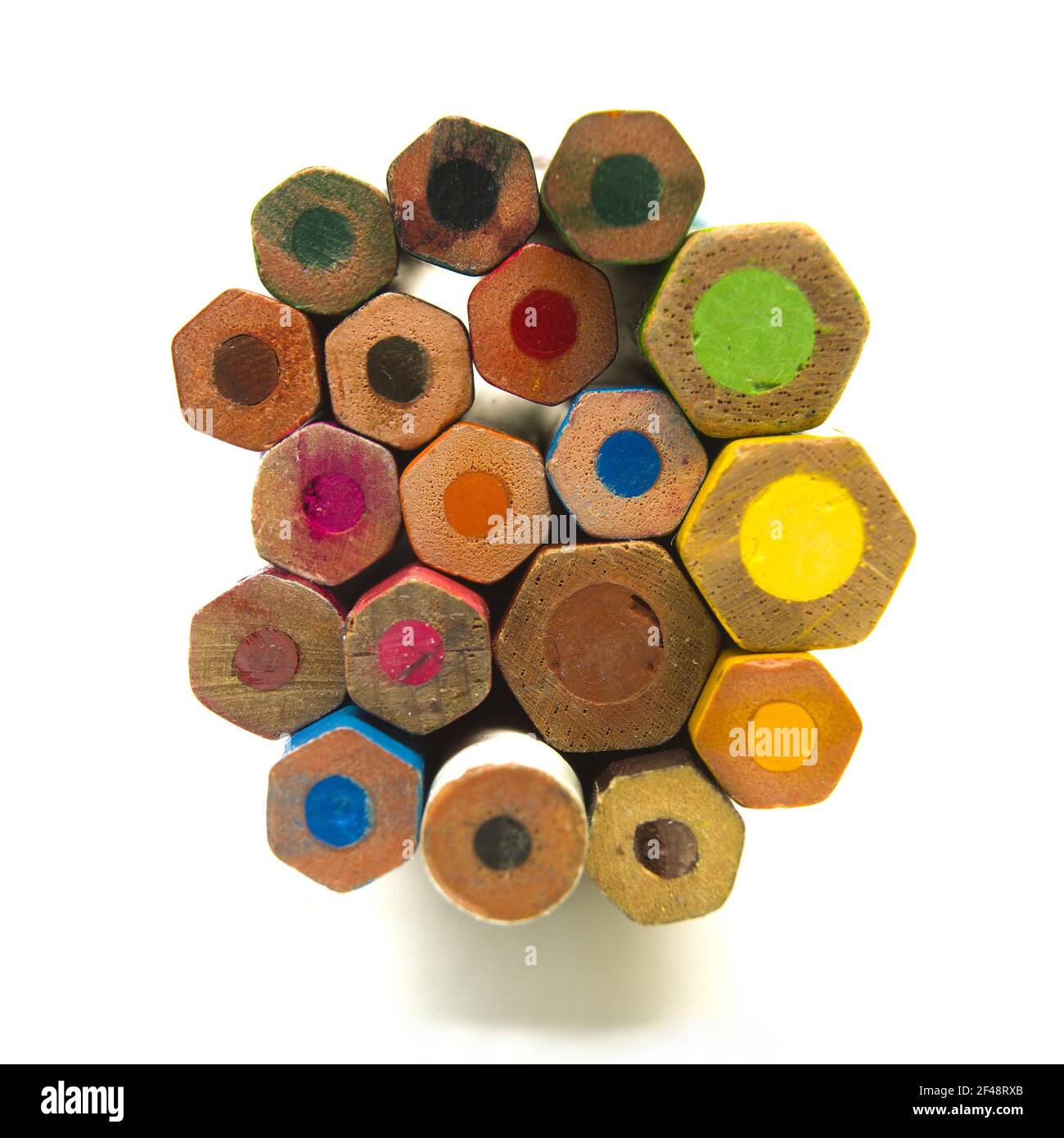A stack of colored pencils on white background Stock Photo - Alamy