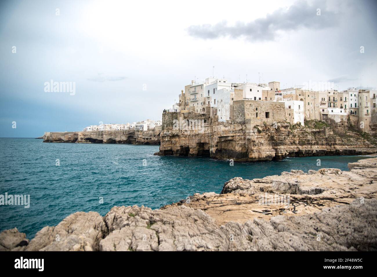 Scenic view of Lama Monachile Cala Porto beach in Polignano a Mare ...