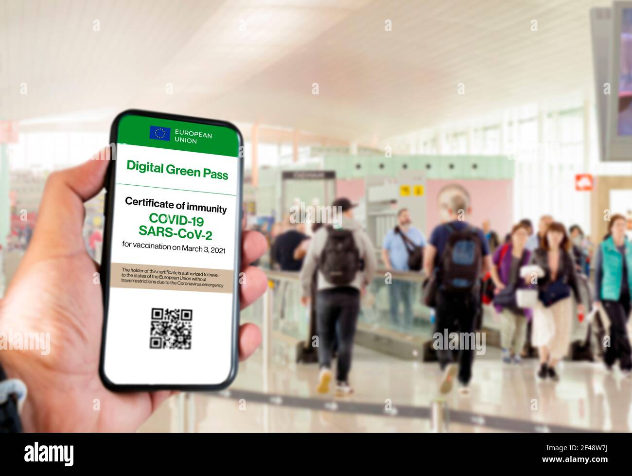 The digital green pass of the european union with the QR code on the ...