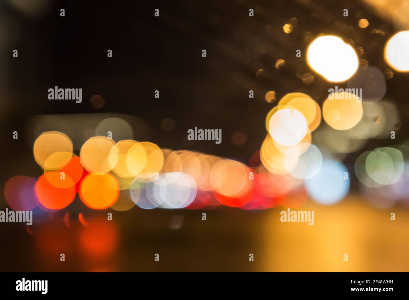 color round bright light spots on abstract background Stock Photo - Alamy