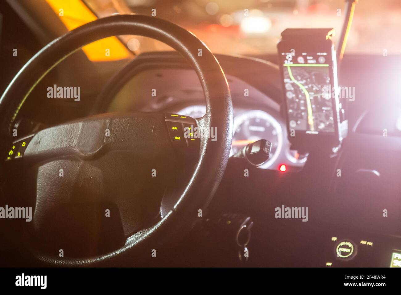 Trip inside the car at night. View through the windshield Stock Photo ...