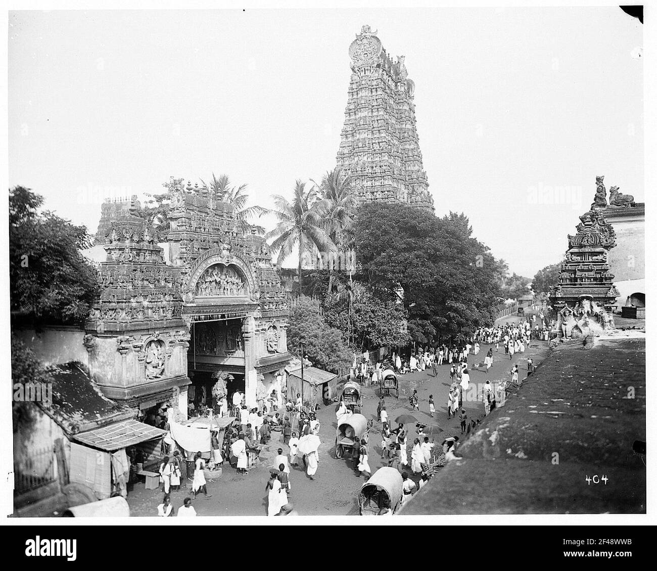 Madurai, India. Street scene in front of a temple gate at the Madurai ...