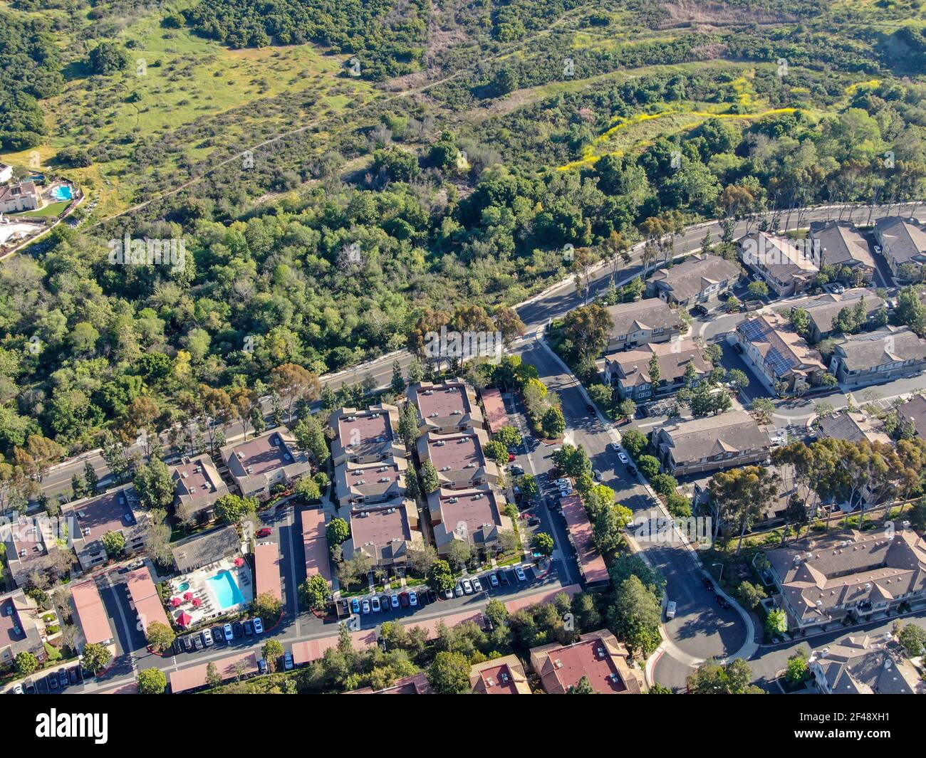 Aerial view of upper middle class neighborhood with big villas around ...