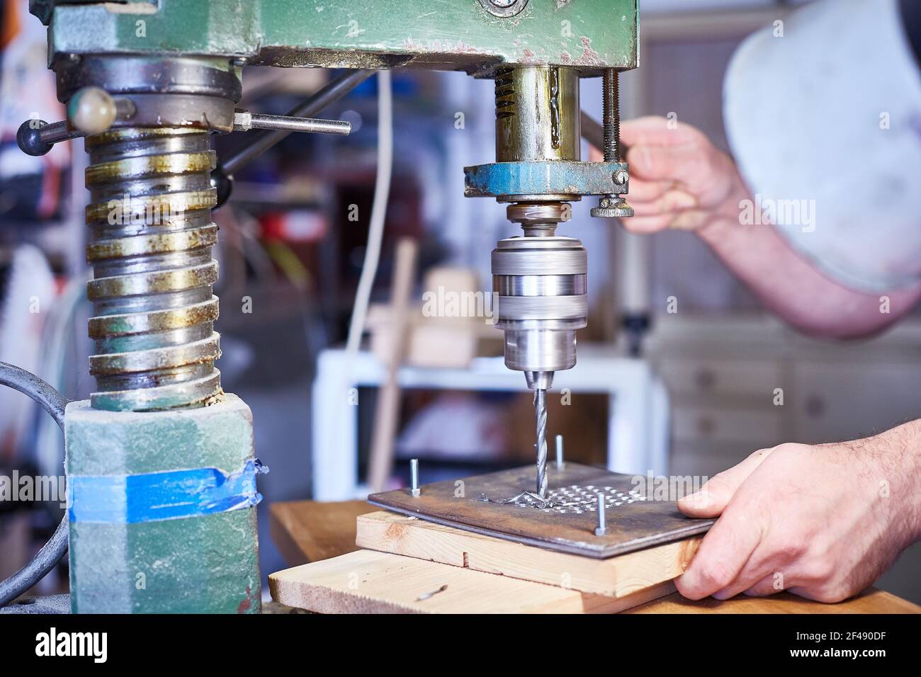 Worker turning on industrial machine hi-res stock photography and ...