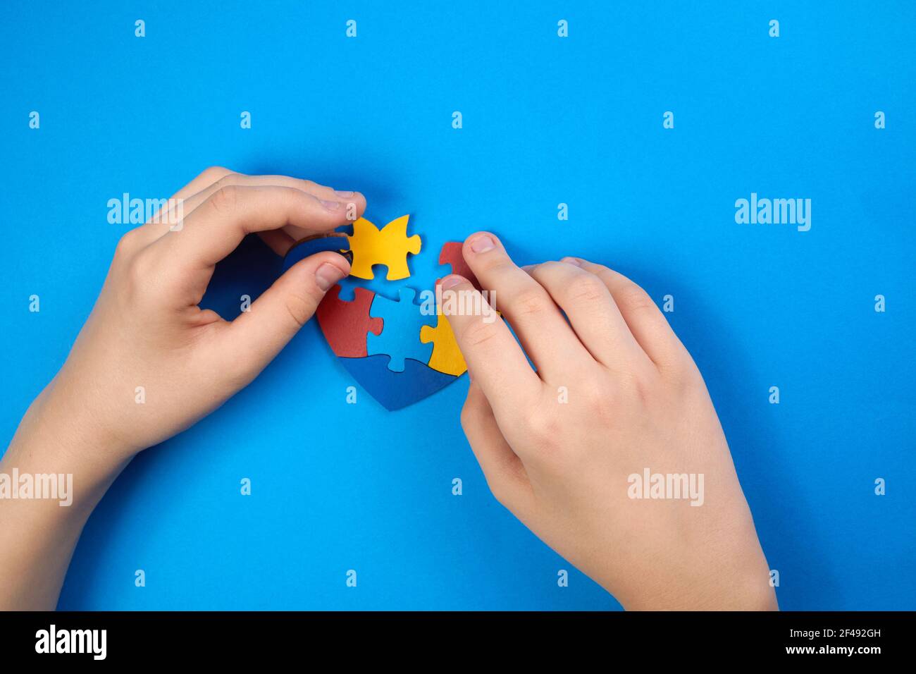 World Autism Awareness day, mental health care concept with puzzle or ...