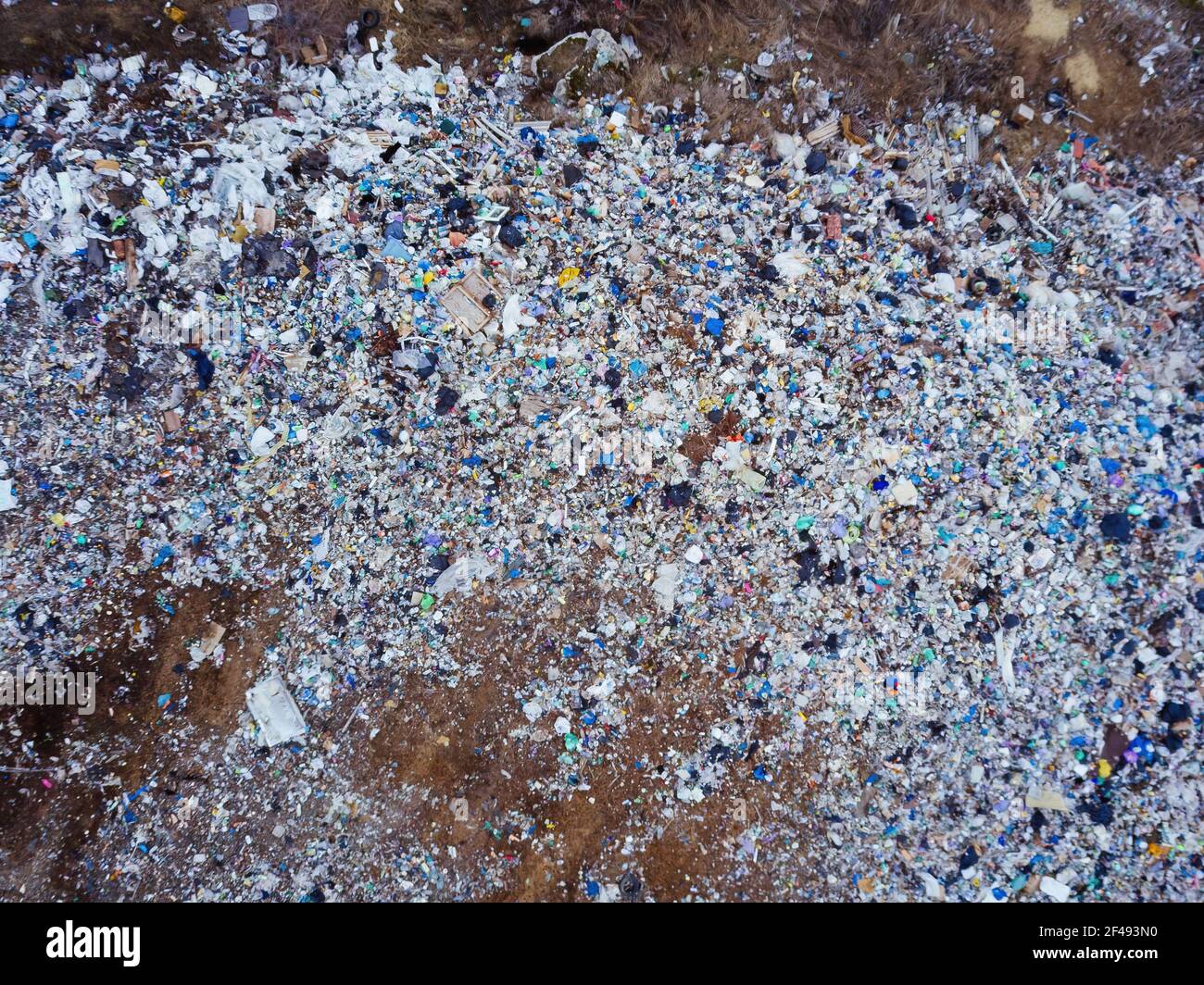 Aerial top view photo of large garbage pile at solid waste landfill ...