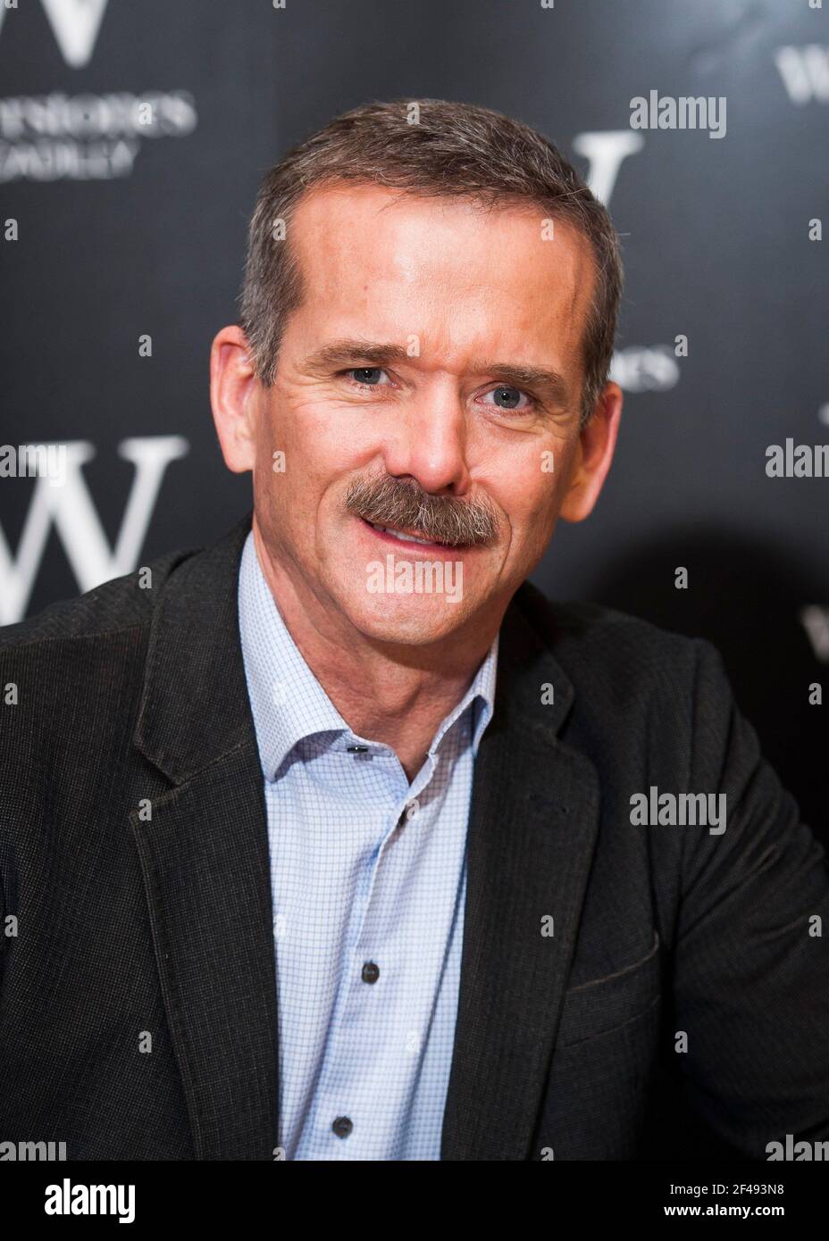 Chris Hadfield signs his book 'You Are Here' at Waterstones Picadilly ...