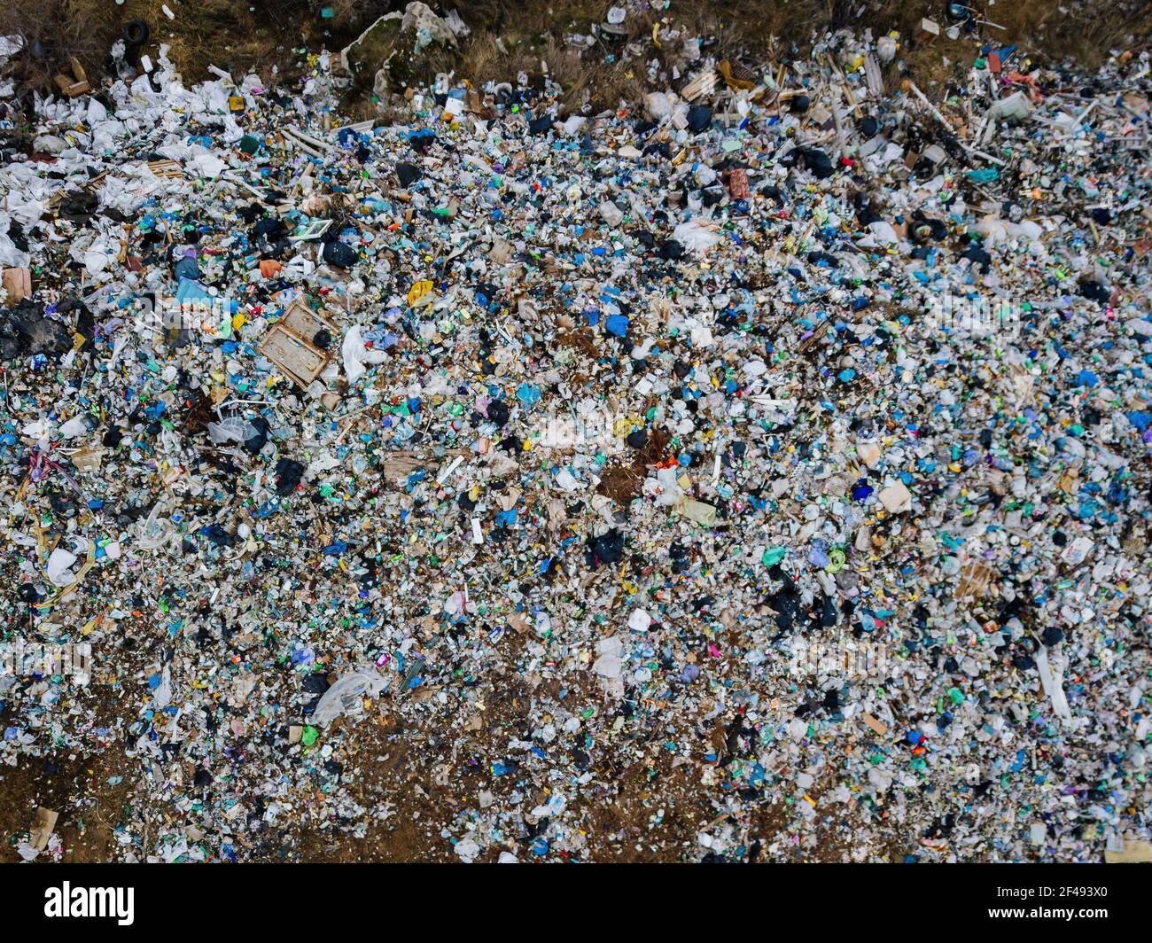 Aerial top view photo of large garbage pile at solid waste landfill ...