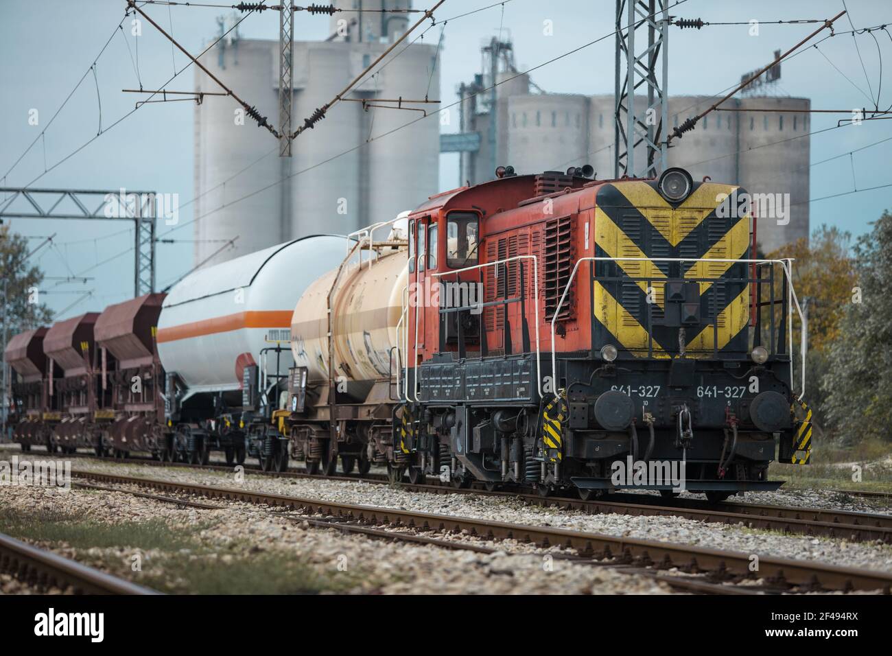 A large industrial train moving on the tracks Stock Photo - Alamy