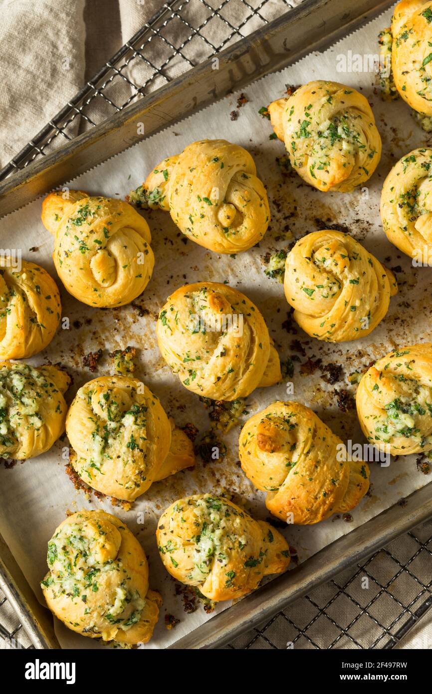 Homemade Buttery Garlic Knot Bread with Parsley Stock Photo - Alamy