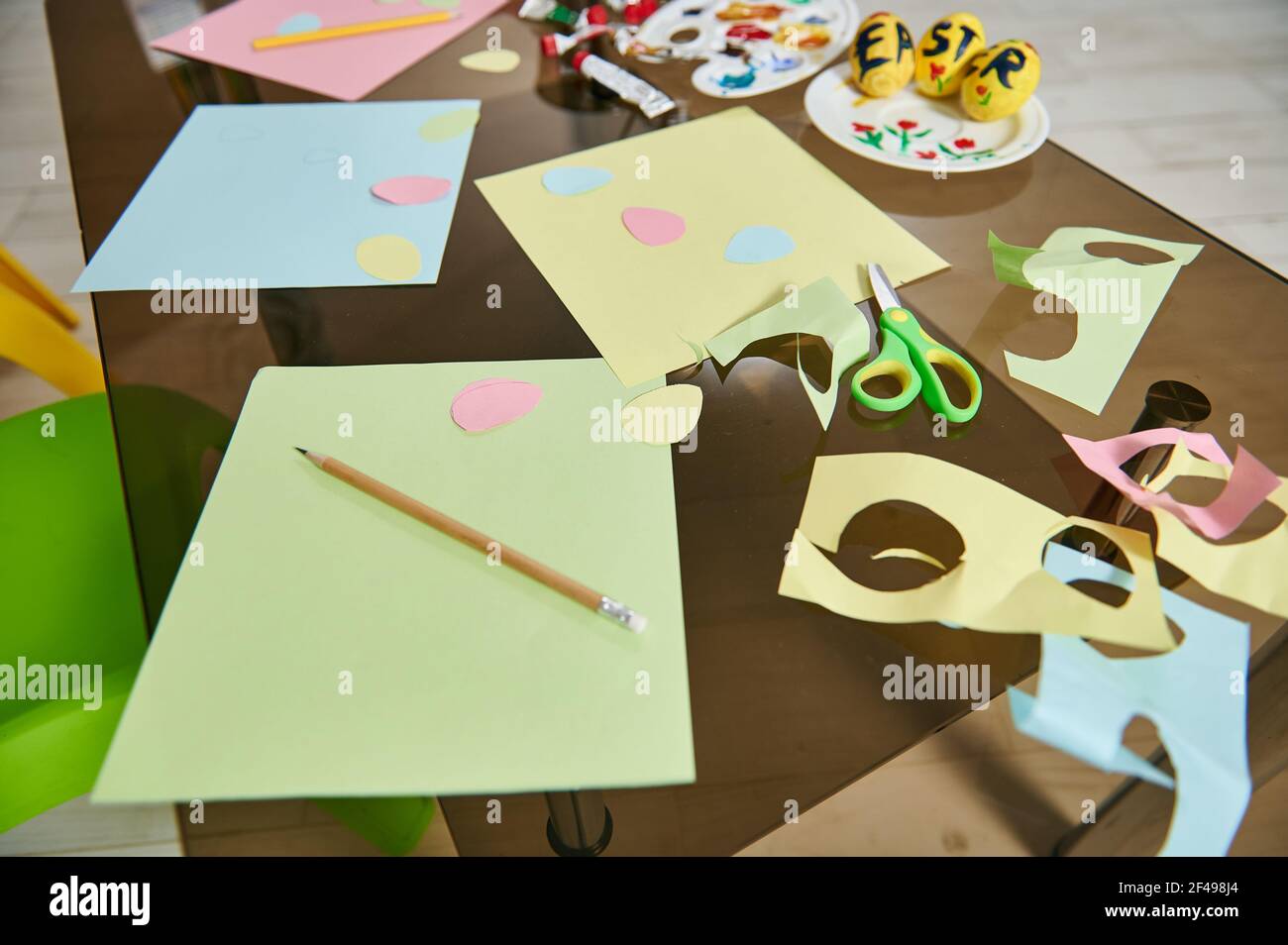 Color paper, scissors, pencil, watercolor palette and other art ...