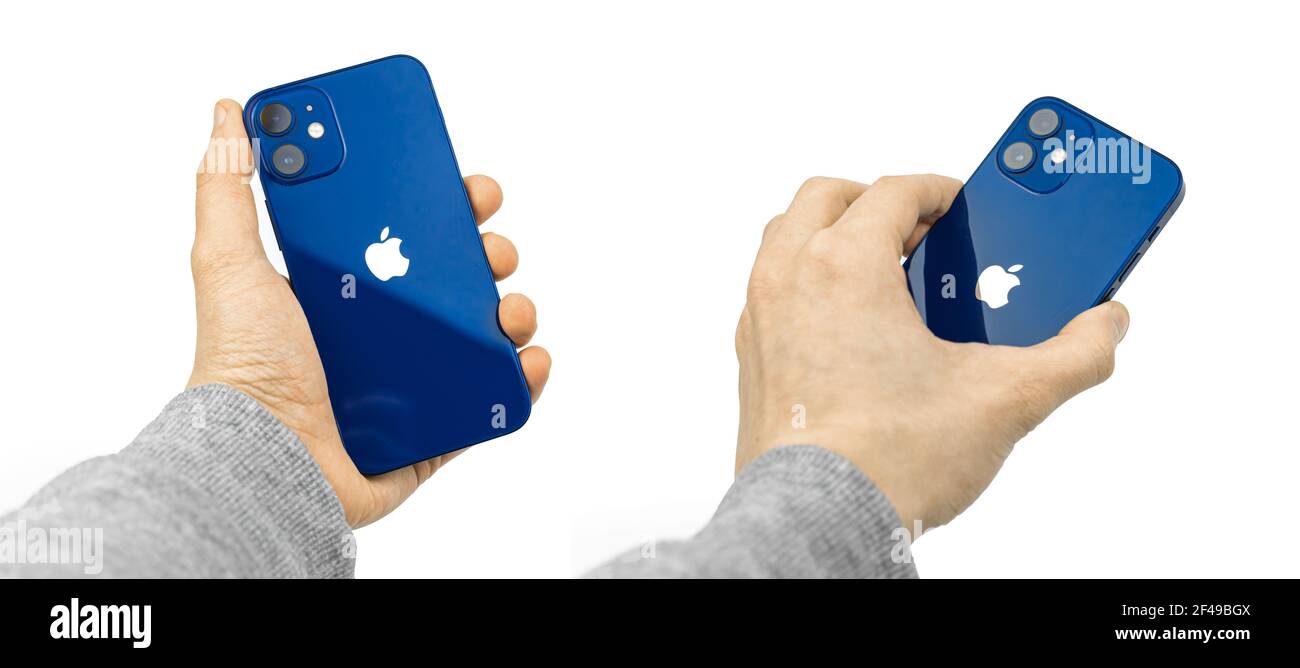 Kharkov, Ukraine - March 12, 2021: Hand holding Apple iPhone 12 Mini ...