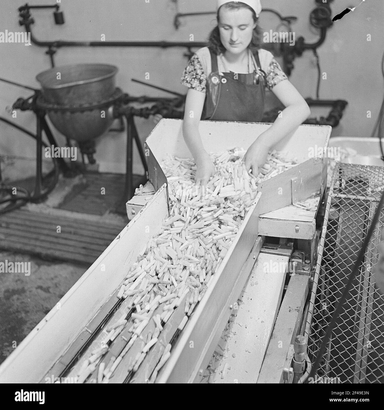 Woman sorting Black and White Stock Photos & Images - Alamy
