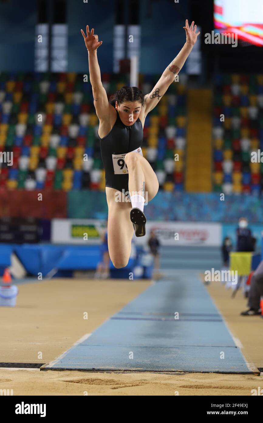ISTANBUL, TURKEY - JANUARY 30, 2021: Undefined athlete triple jumping ...