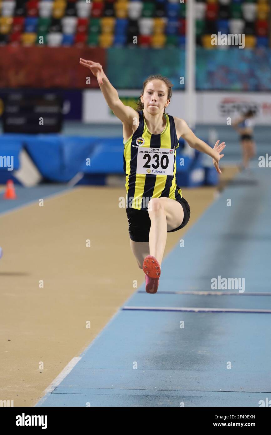 ISTANBUL, TURKEY - JANUARY 30, 2021: Undefined athlete triple jumping ...