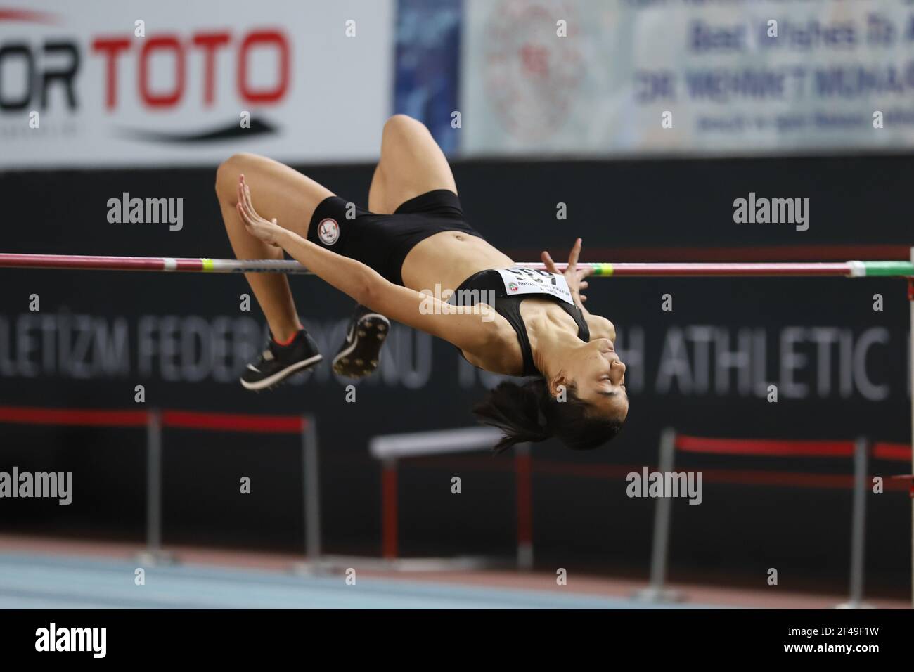 ISTANBUL, TURKEY - JANUARY 31, 2021: Undefined athlete high jumping ...