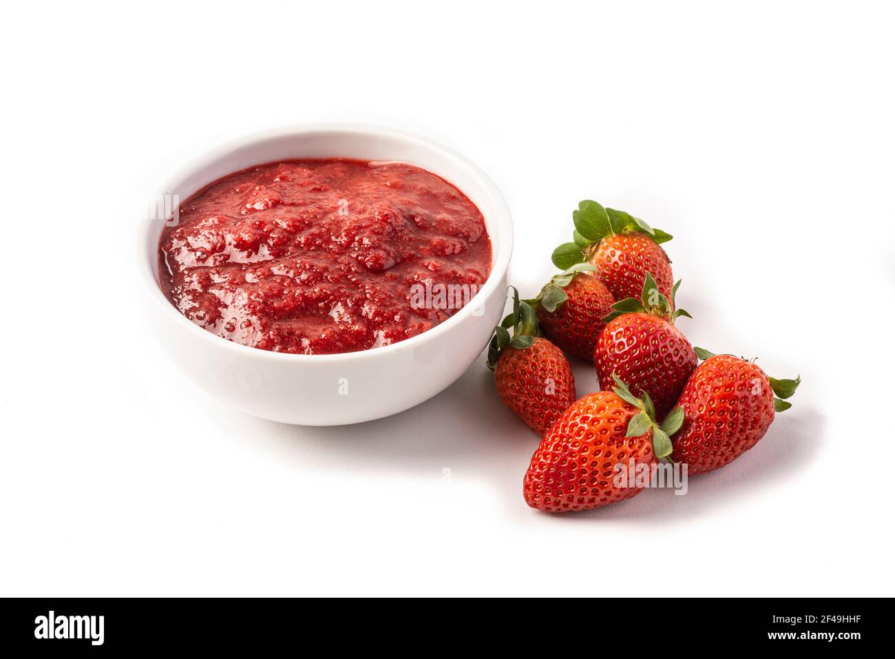 Strawberry jam and straberries isolated over white background Stock ...