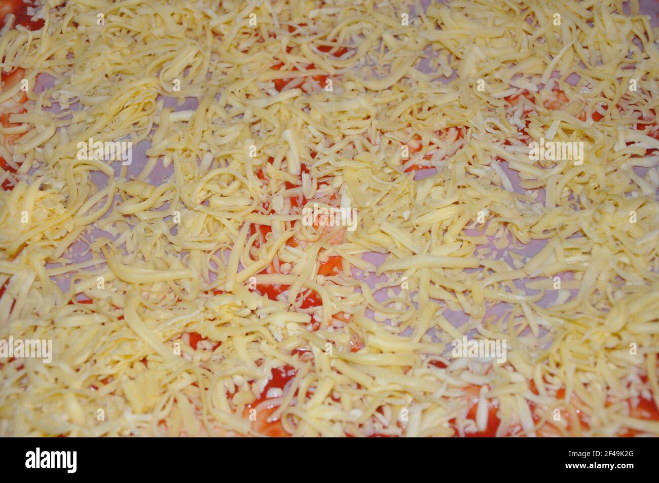 Raw pizza ham cheese ready to bake Stock Photo - Alamy