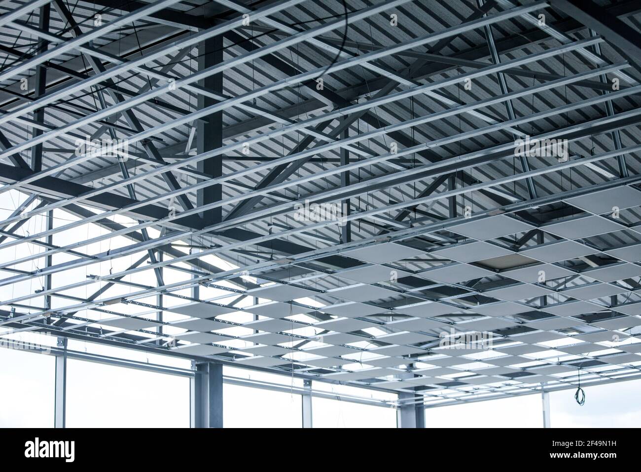 A closeup of metal construction for installing a suspended ceiling ...