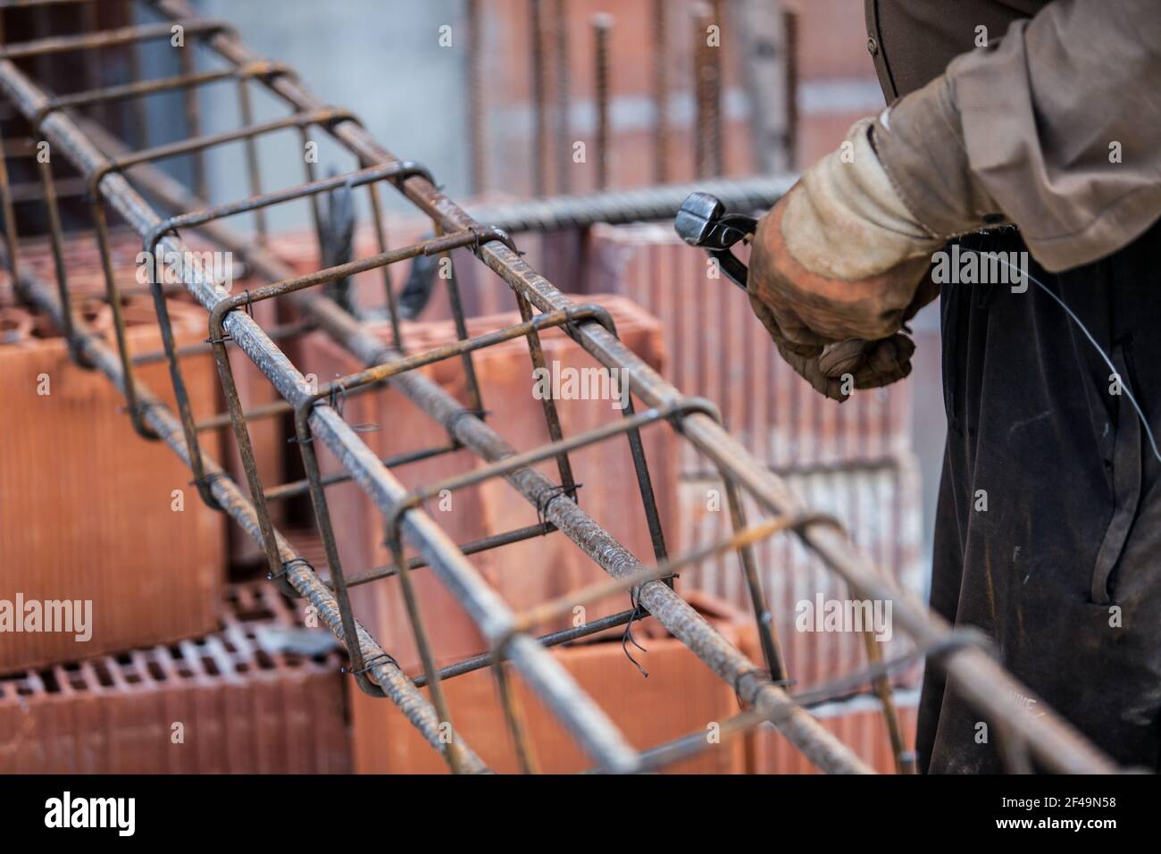 A construction worker working on the reinforcement Stock Photo - Alamy