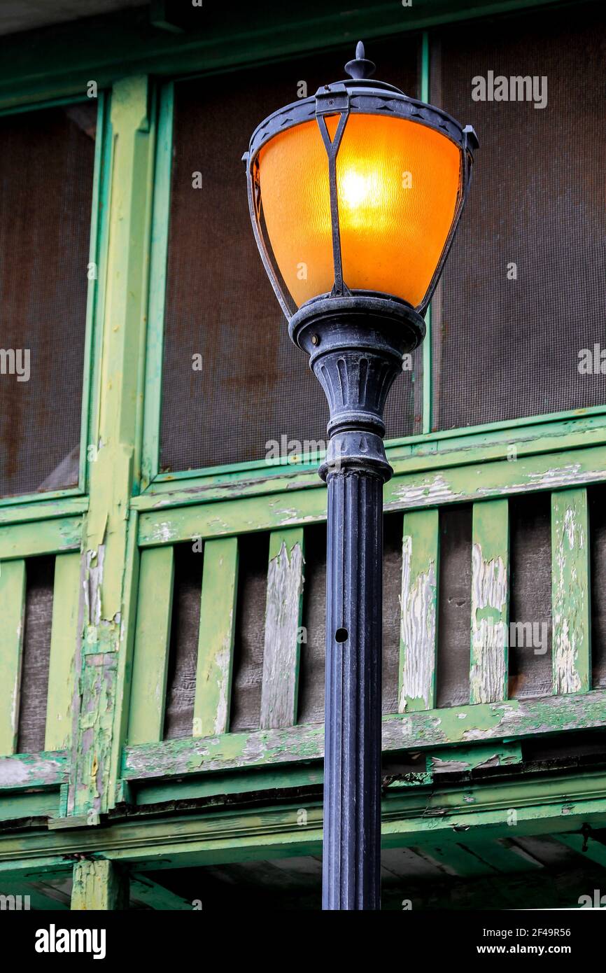 Antique street lamp with yellow light Stock Photo - Alamy