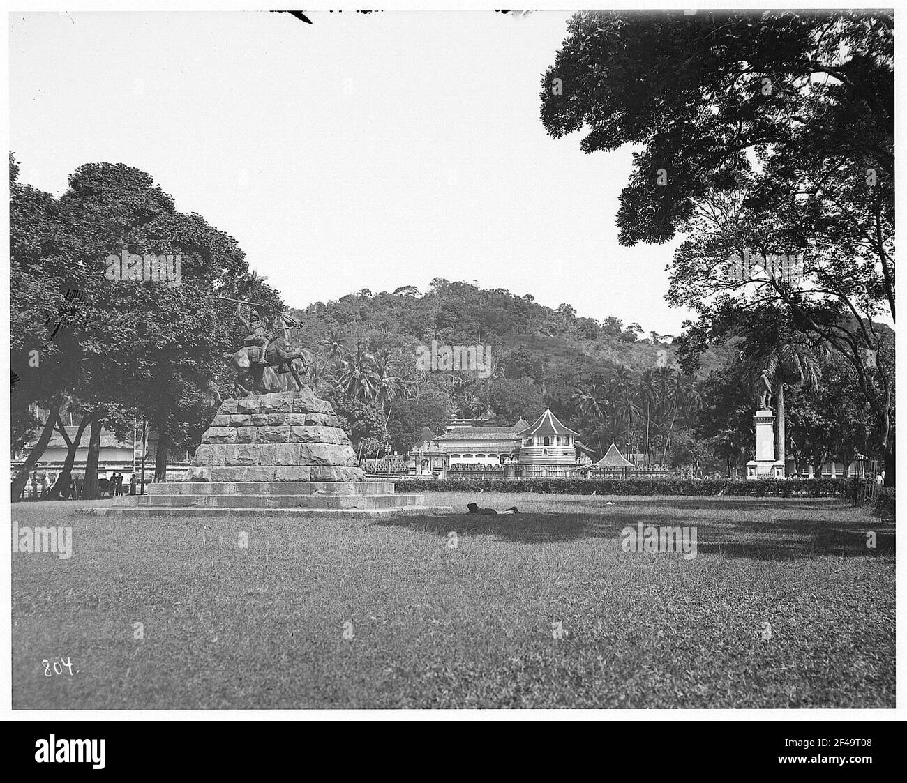 Kandy (Sri Lanka). Park with riding monument. View to the toothed ...