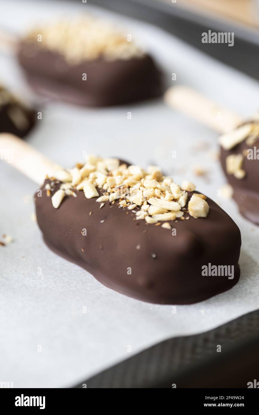 A vertical closeup shot of a chocolate ice cream bar Stock Photo - Alamy