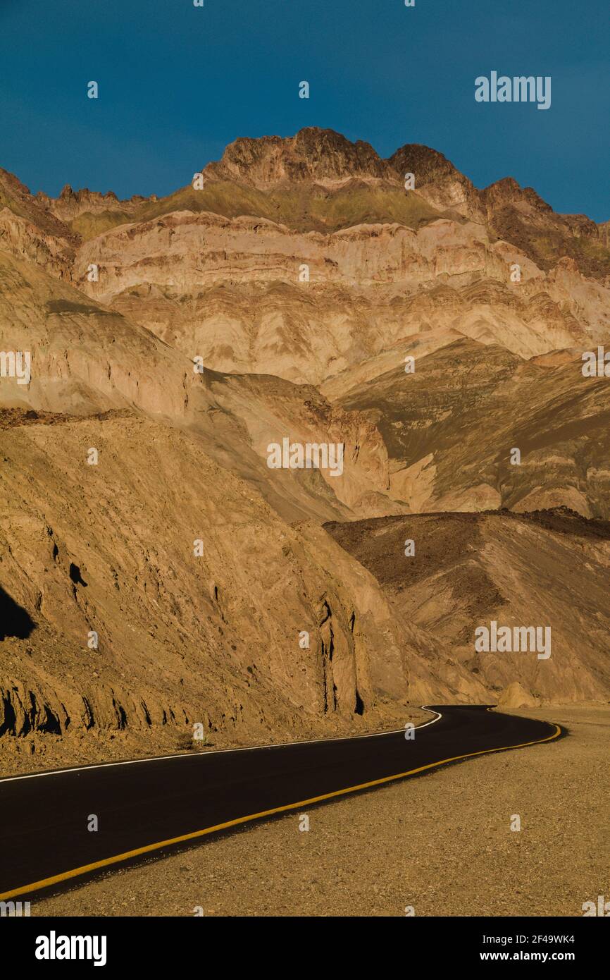 An empty road in Death Valley, at golden hour Stock Photo - Alamy