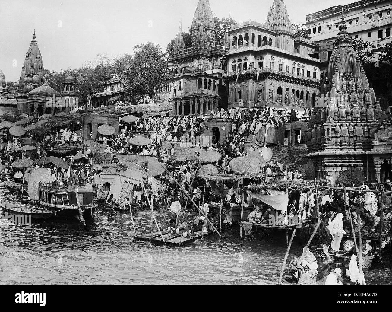Varanasi (Benares), India. Pilgrims at the Manikarnika Ghat in Ritual ...